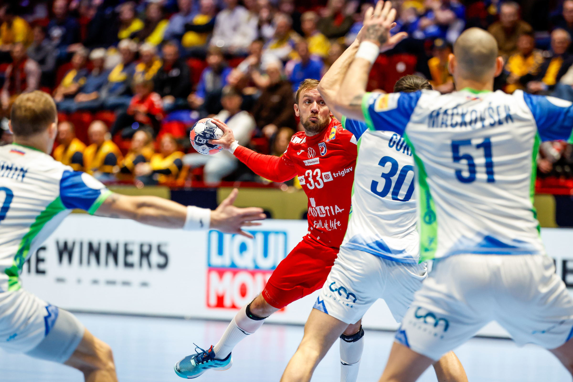 Croatia edge Slovenia in handball derby, keep semi-final push on track